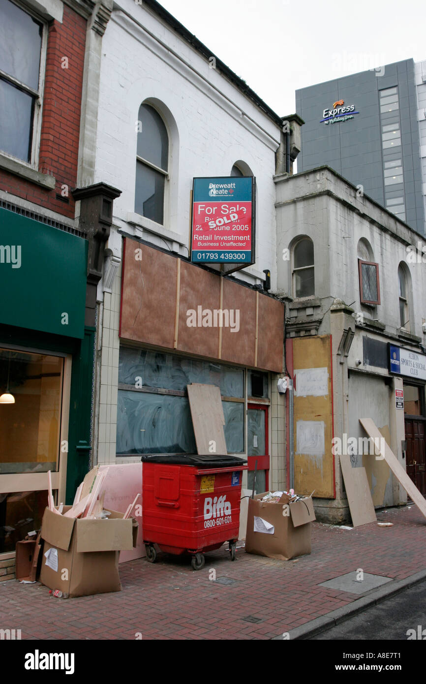 Retail shop premises undergoing repair and renovations Stock Photo - Alamy