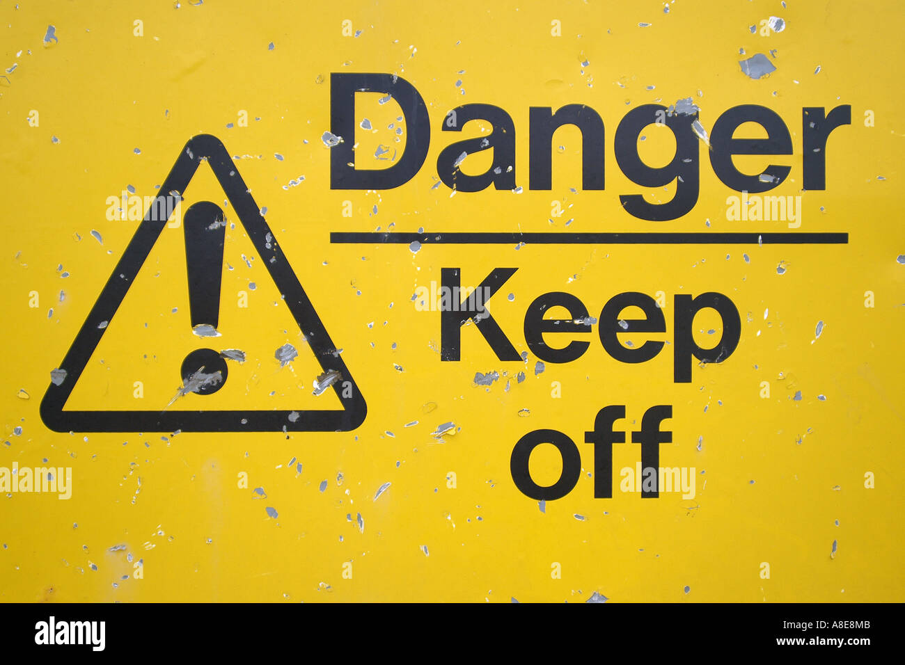 Danger Keep Off Sign in yellow and black Stock Photo - Alamy
