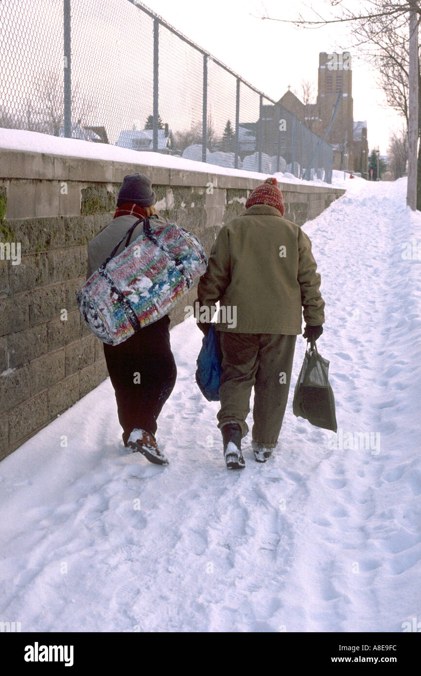 Homeless friends age 41 & 43 walking to the next stop. St Paul ...