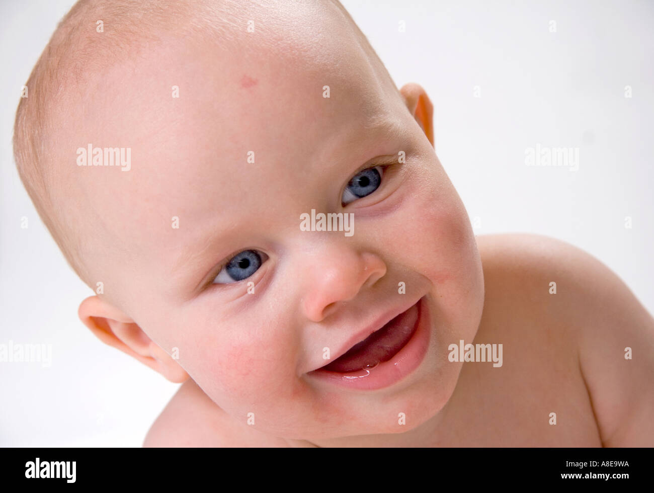 seven month old baby laughing Stock Photo - Alamy