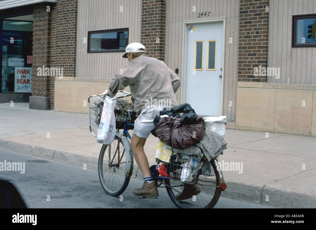 Homeless man age 42 gathering valuable items on his bike. St Paul ...