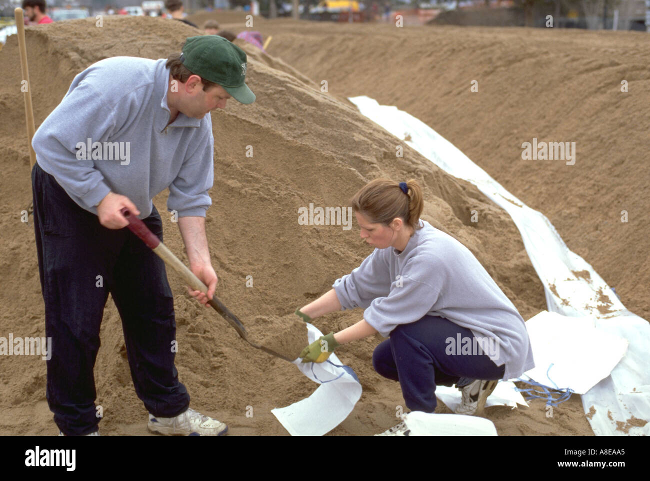 Filling sandbags hi-res stock photography and images - Alamy