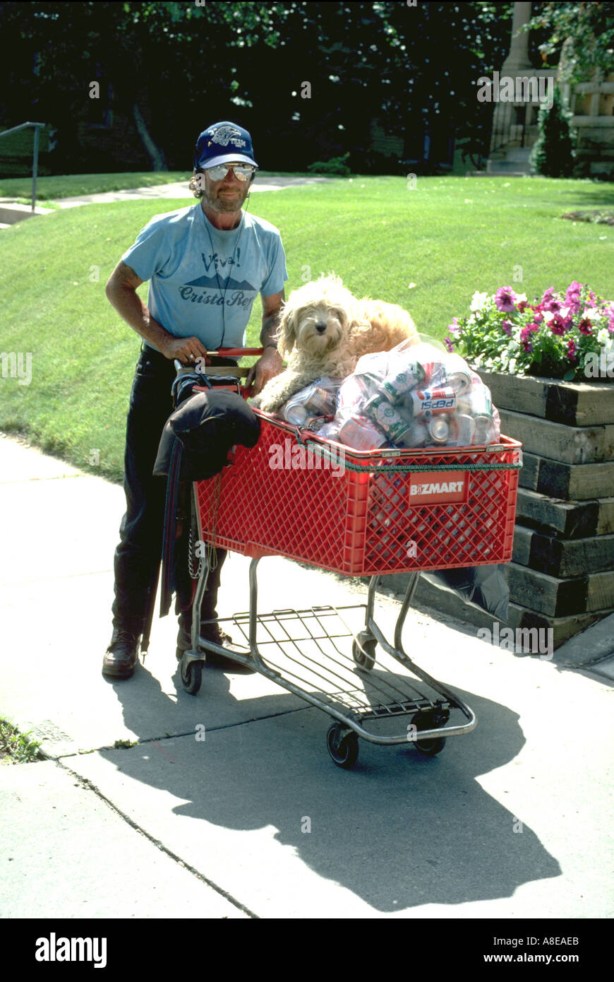 Homeless man pushing shopping cart hi-res stock photography and images ...