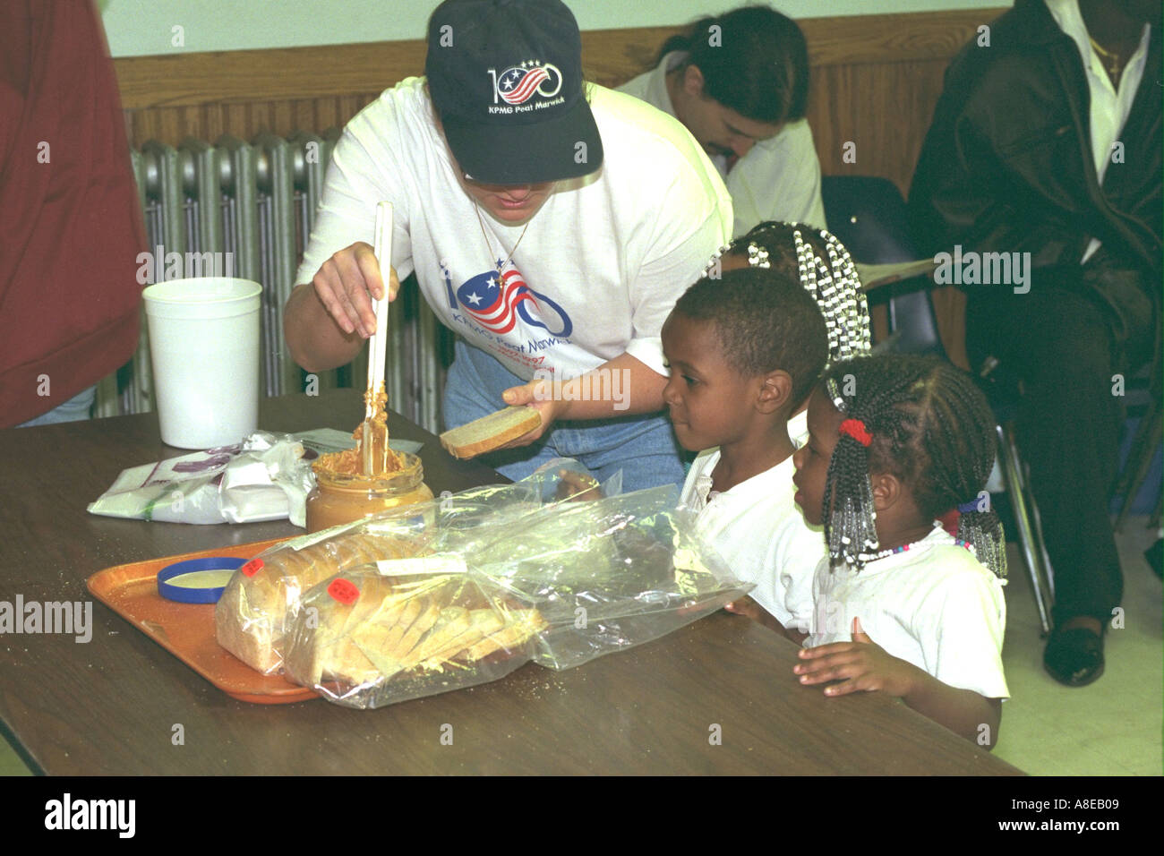 Poor kids sharing food usa hi-res stock photography and images - Alamy
