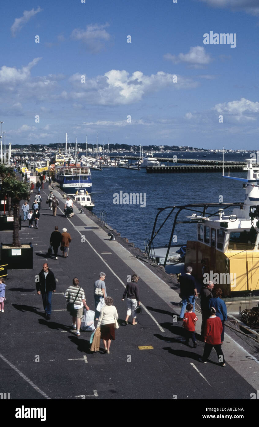 Locals and visitors walking on Poole Quay Stock Photo - Alamy