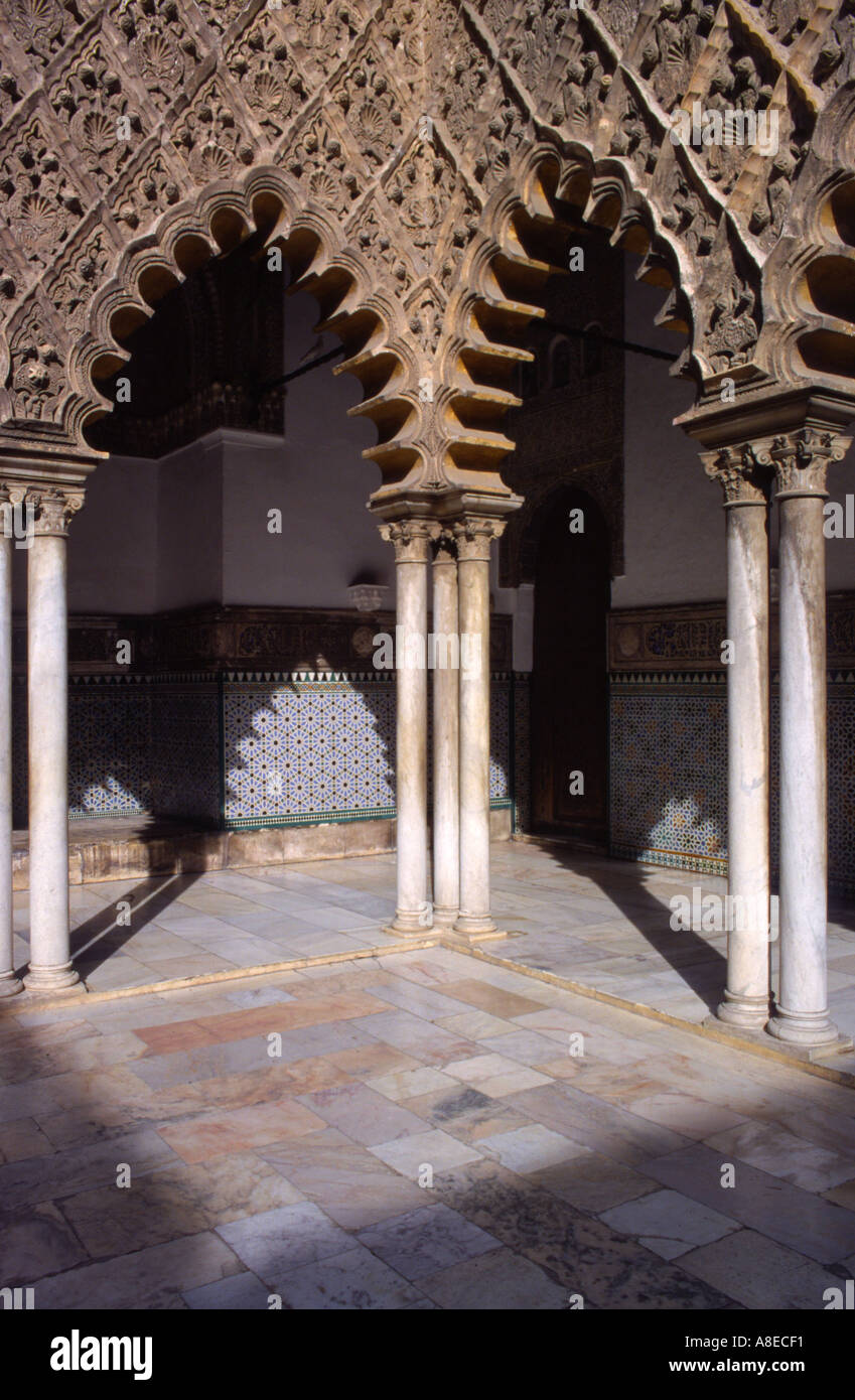 Islamic arches and colonnade on the Moorish Reales Alcazares Stock ...