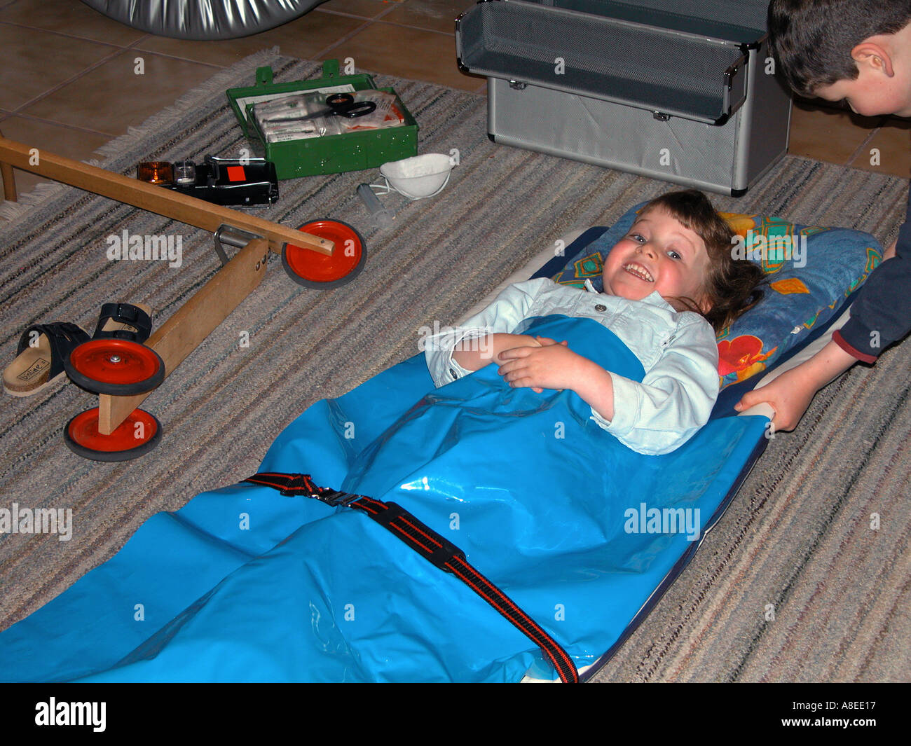 children playing doctor at home Stock Photo - Alamy