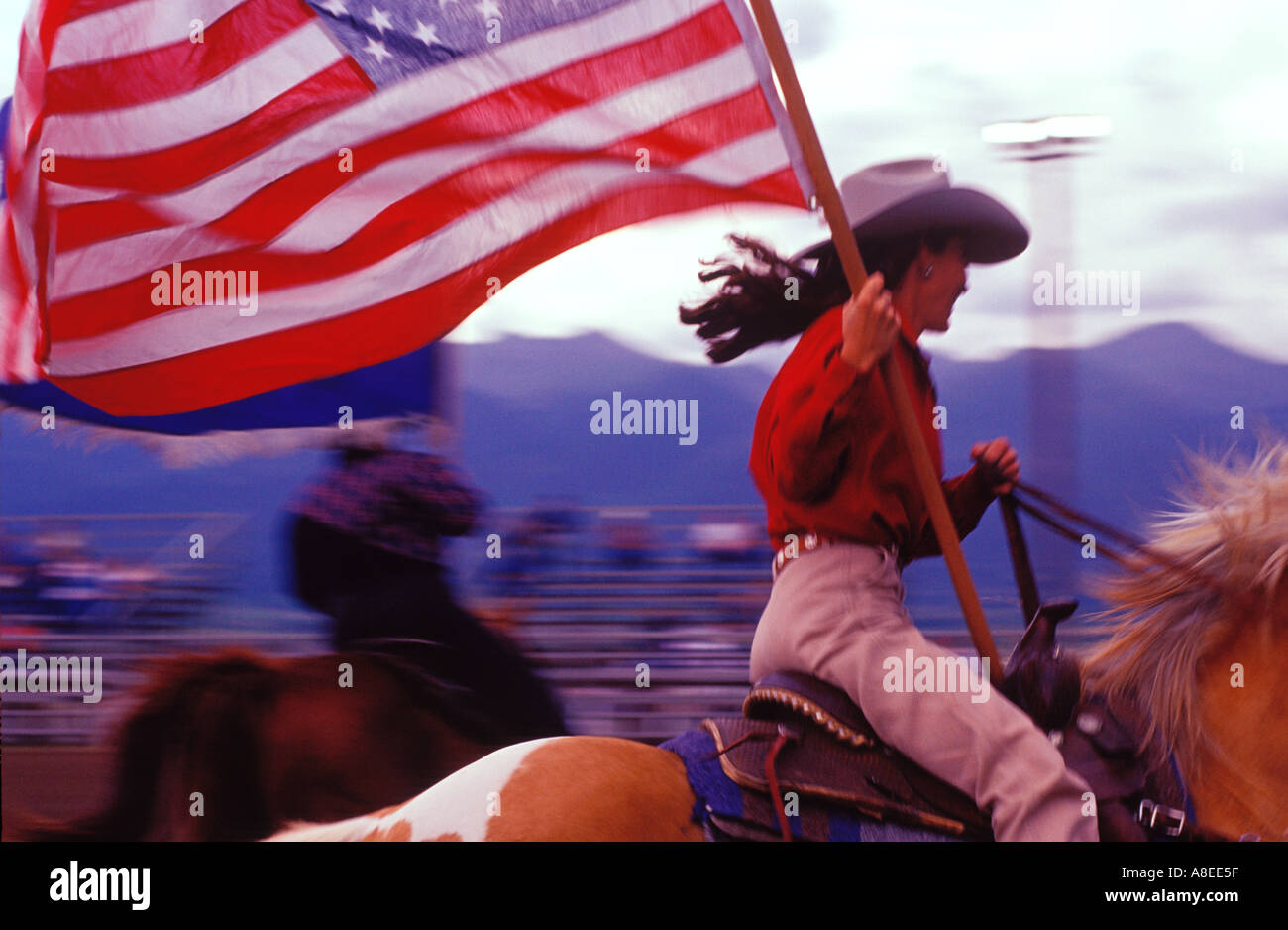 Flagbearer at rodeo with US Flag Colorado Stock Photo - Alamy
