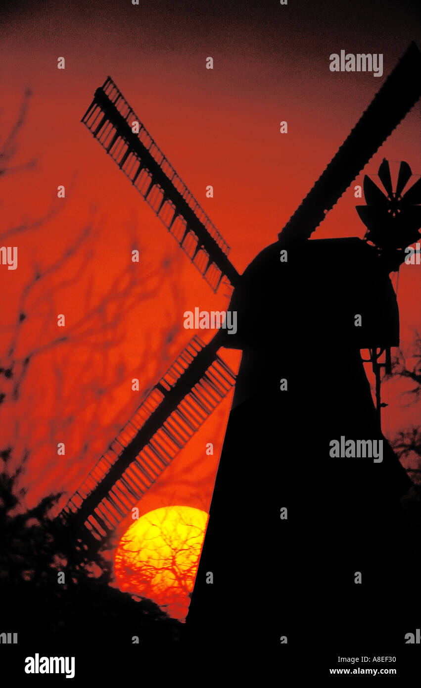 Sun setting behind Cranbrook Windmill Kent UK Stock Photo - Alamy