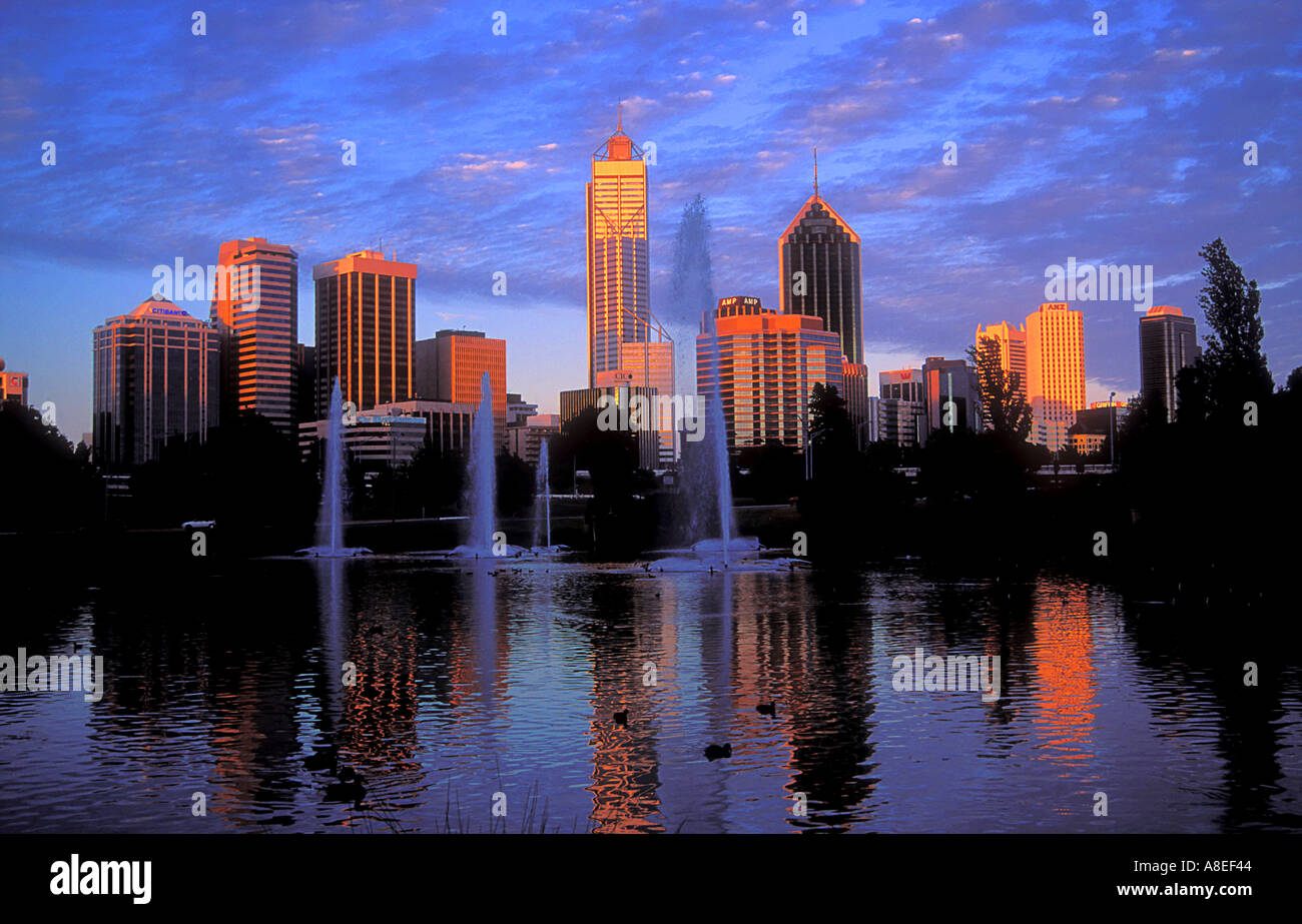 Evening view of downtown Perth Western Australia reflected in a lake ...