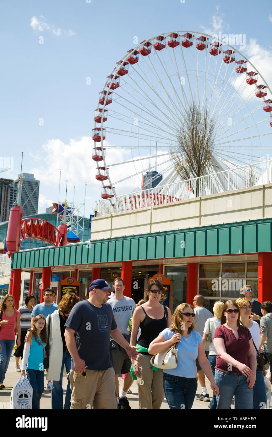 CHICAGO Illinois People walking Ferris wheel at Navy Pier in background ...