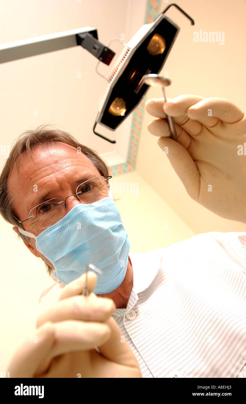 Dentist with tools Stock Photo - Alamy