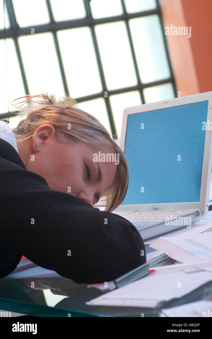 Girl falling asleep on computer hi-res stock photography and images - Alamy