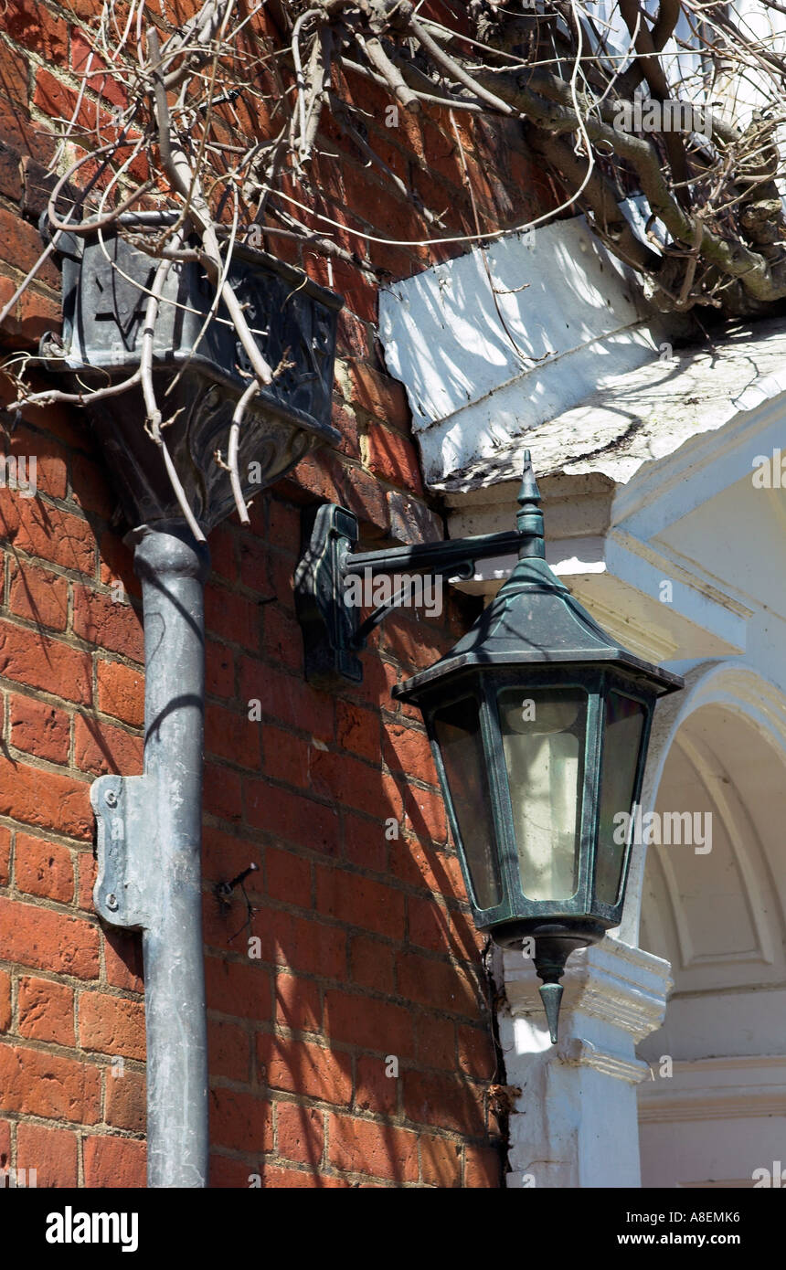 Detail of lead drain pipe and an old-fashioned lamp on the Bucklers ...