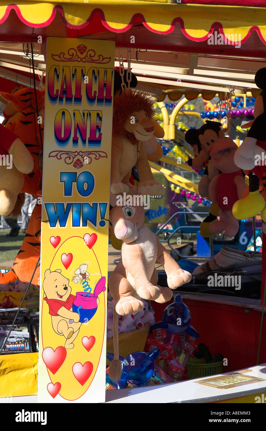 Brightly coloured fairground sideshows, travelling fair, England Stock ...