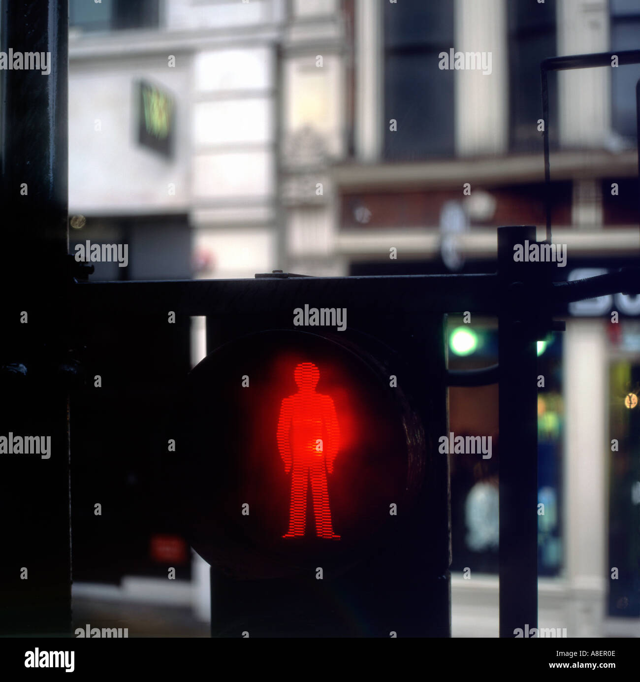 Glowing red pedestrian traffic light on Oxford Street, London England ...