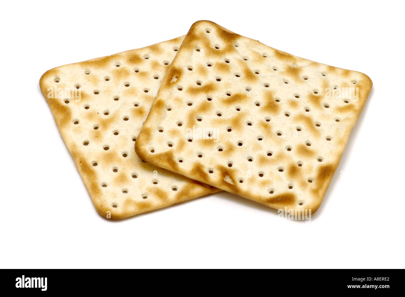 2 two fat free Cracker biscuit on white background Stock Photo - Alamy