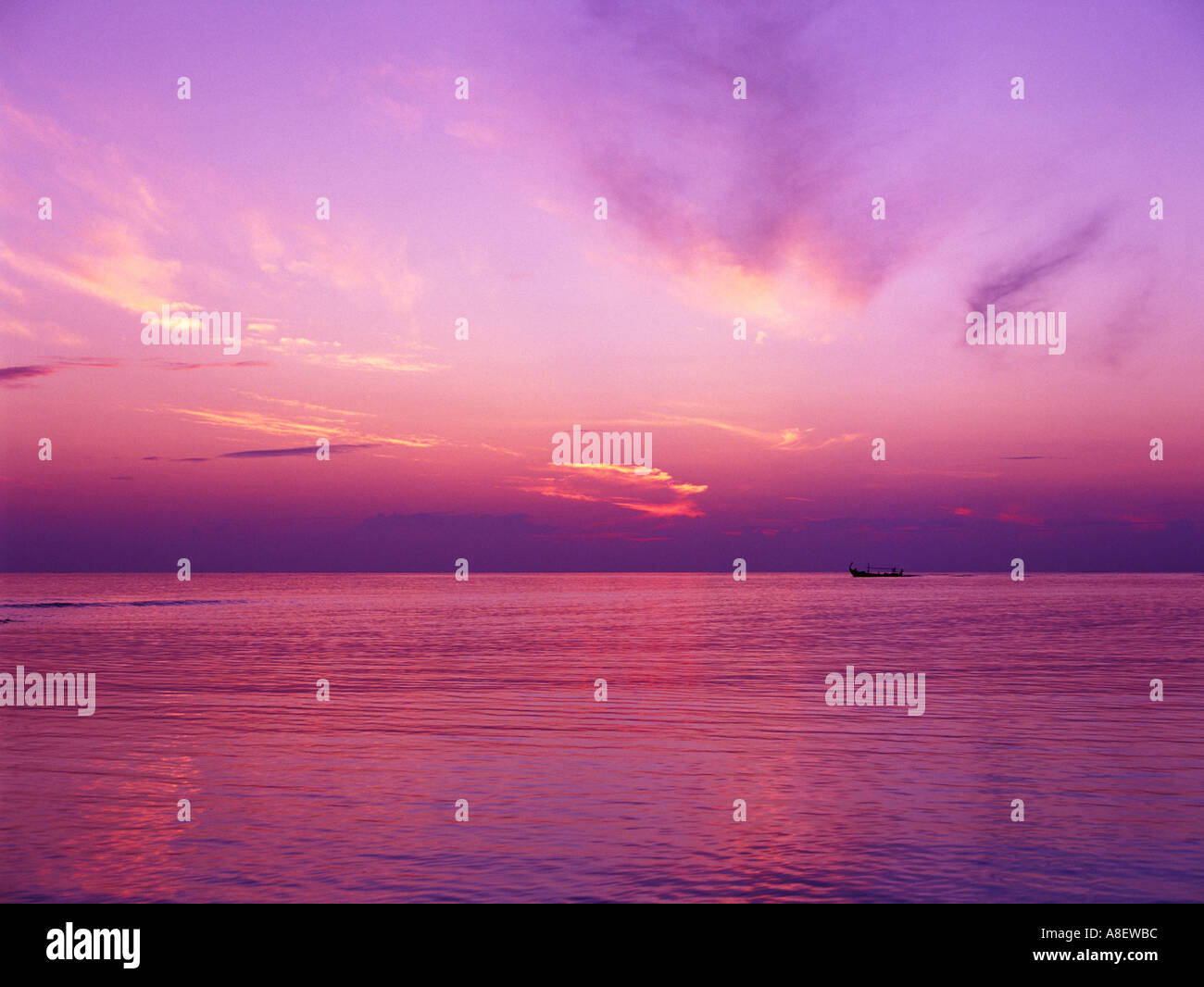 Maldives islands Indian ocean Baa atoll and boat sunset Stock Photo - Alamy