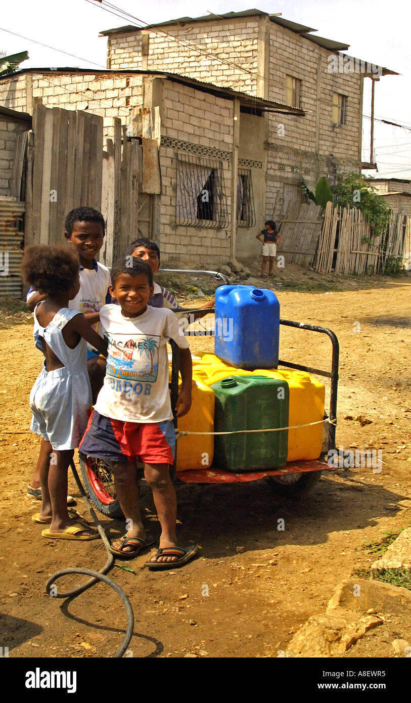 Ecuador. guayaquil boys selling water Stock Photo - Alamy