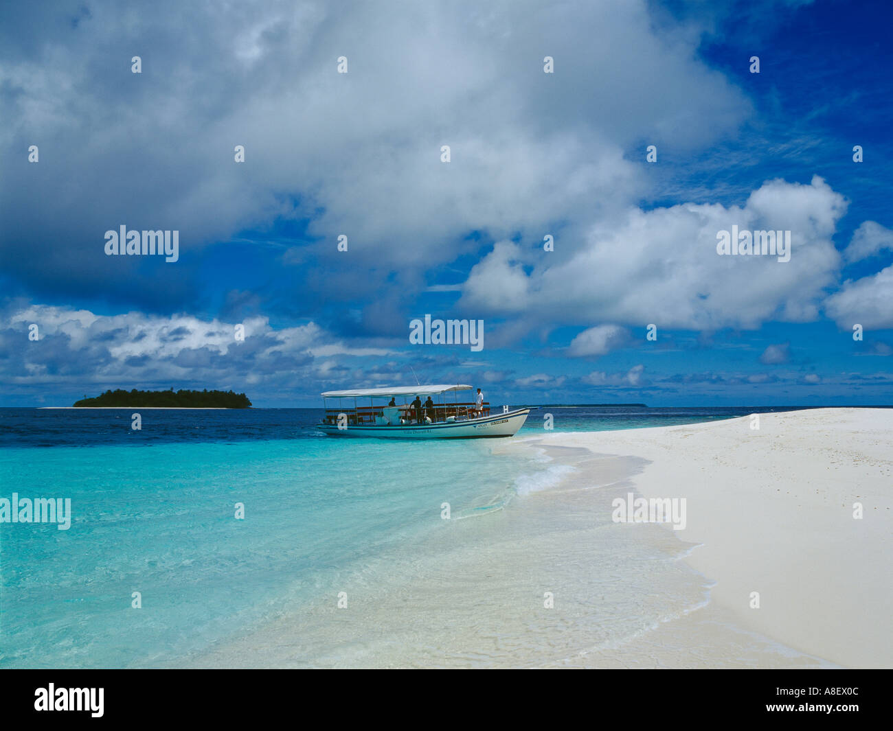 Maldives islands Indian ocean Baa atoll safari boat, beach Stock Photo ...