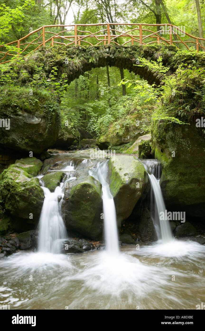 The old stone bridge called the Scheissentempel, Mullerthal near ...