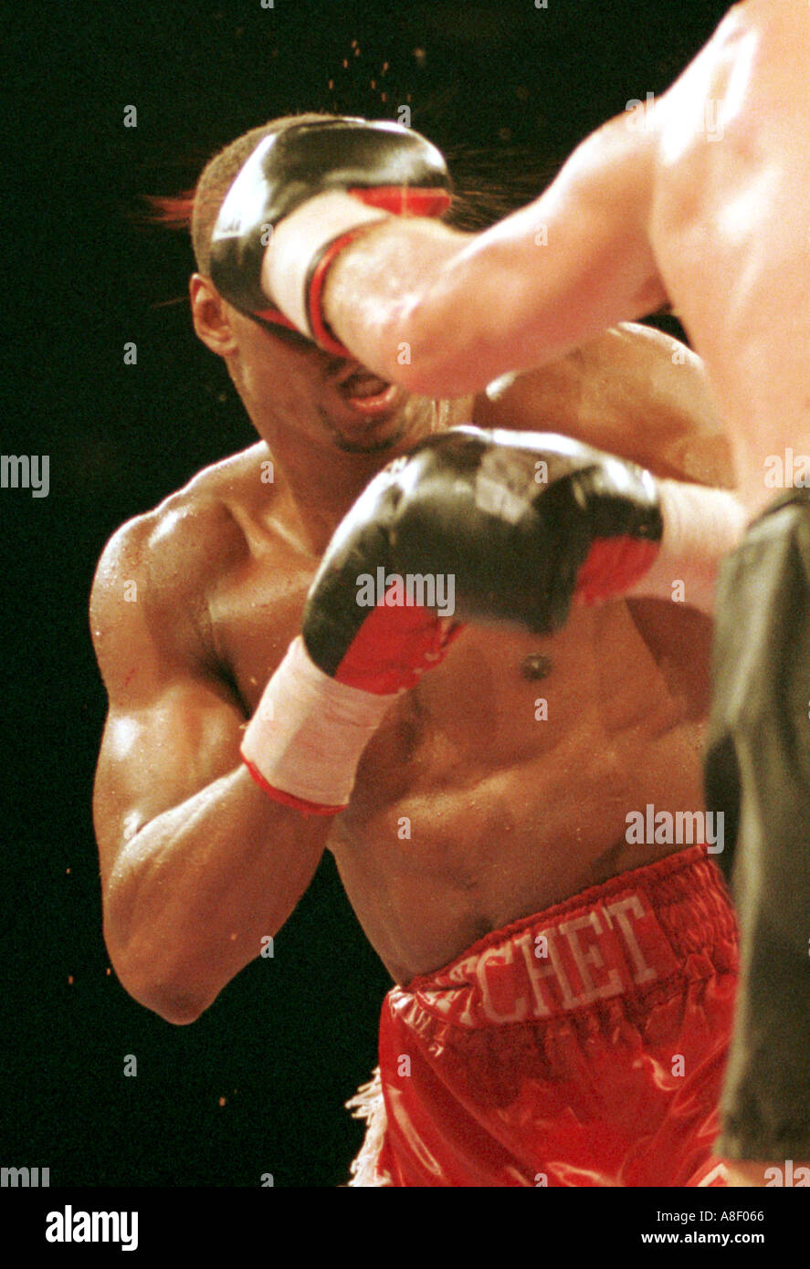 Direct hit during a boxing match Stock Photo - Alamy