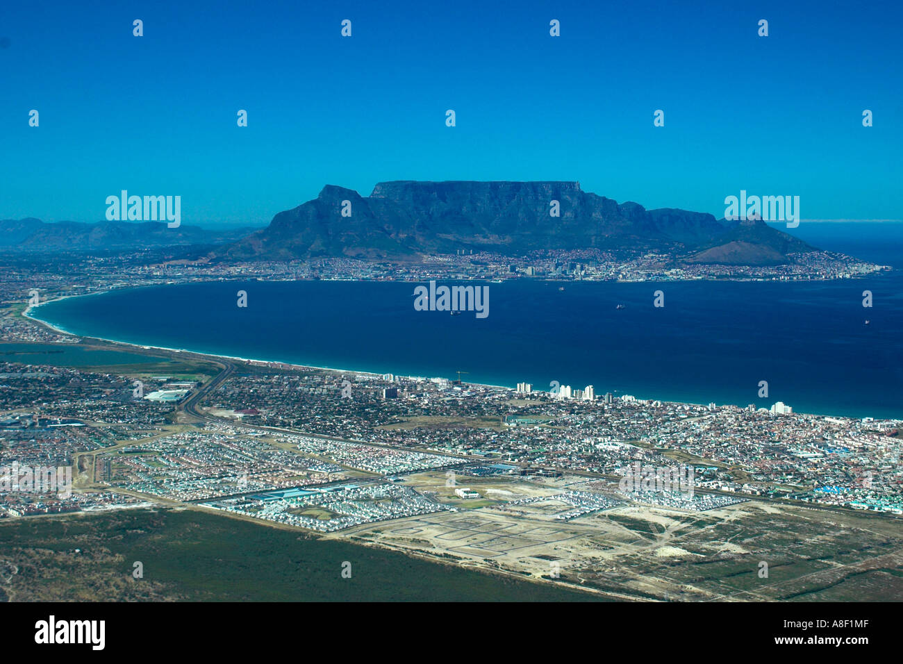 An arial view of Table Mountain with table bay and Blouwberg strand ...