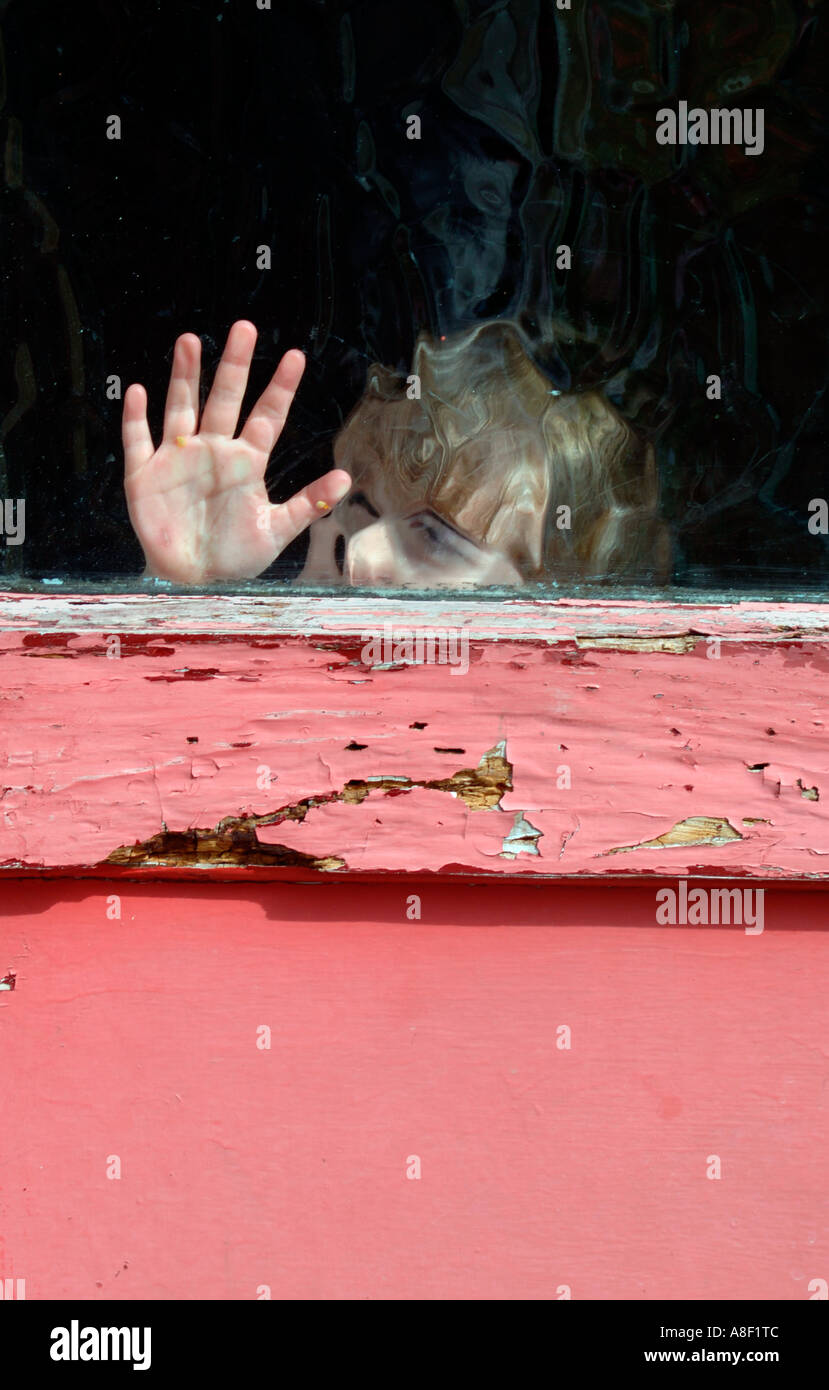 Little Girl Behind Glass Door Stock Photo - Alamy