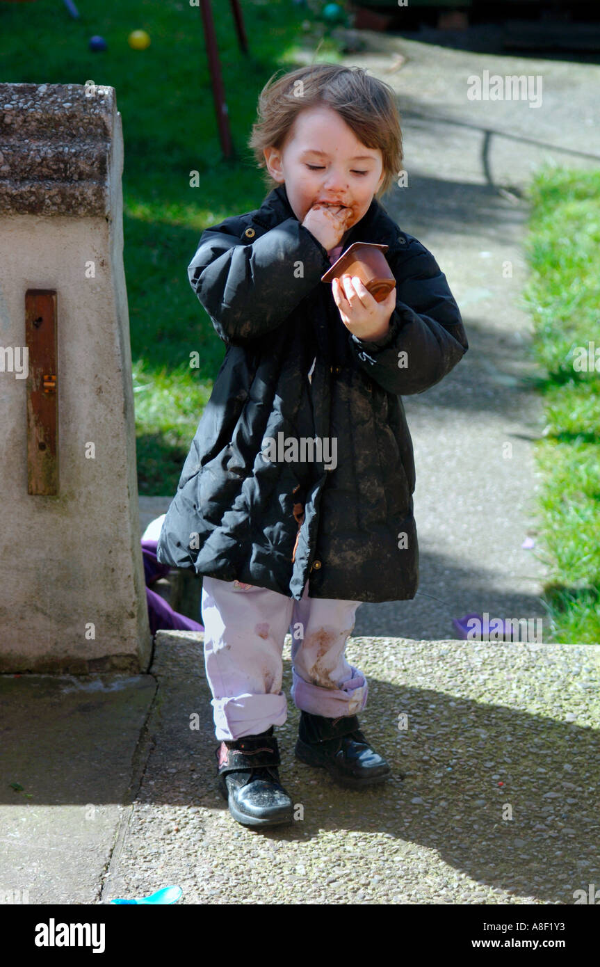Little Girl Eating A Chocolate Pudding Stock Photo - Alamy