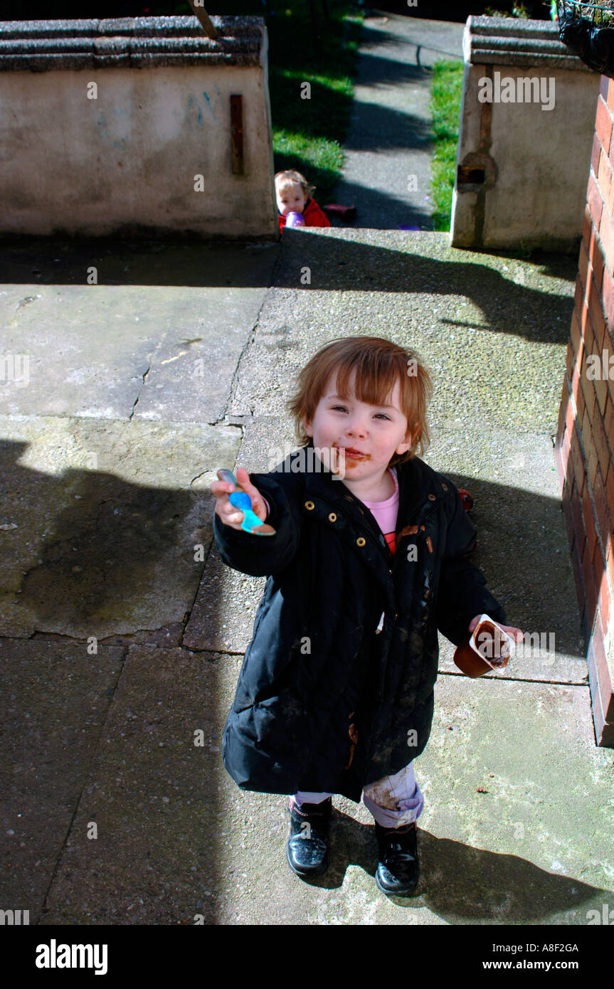 Little Girl Offering Her Food Stock Photo - Alamy