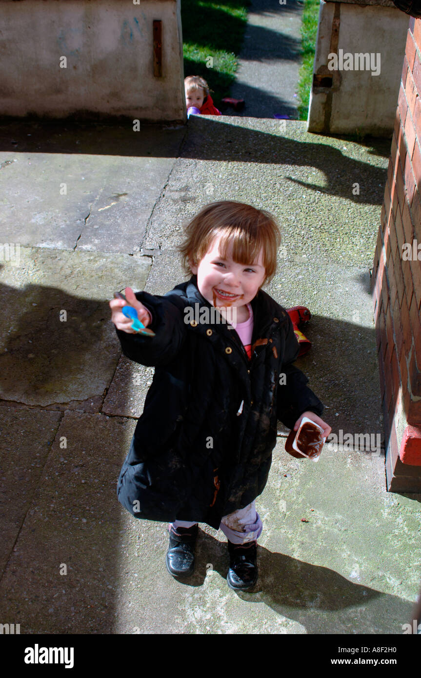 Little Girl Offering Her Food Stock Photo - Alamy