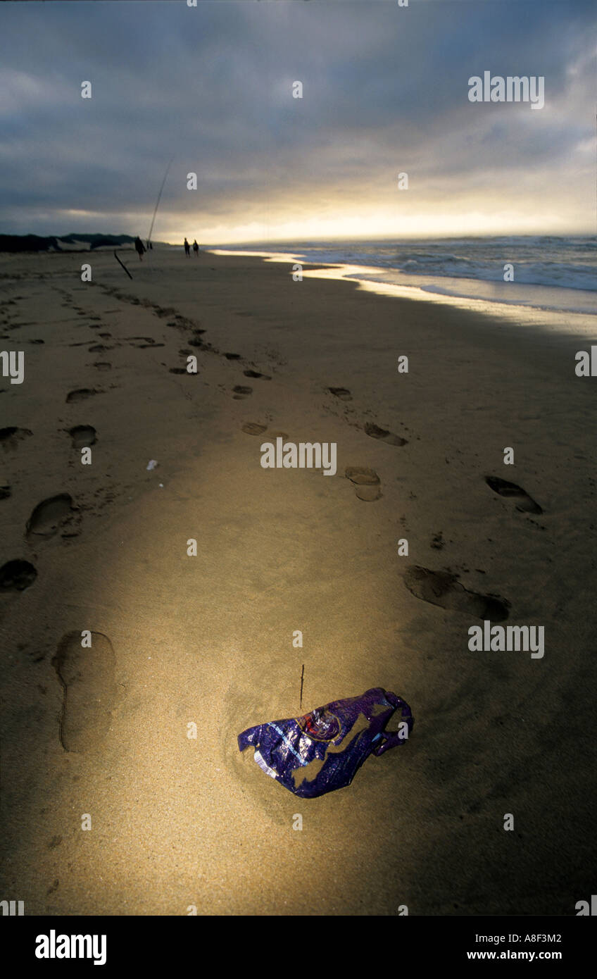 Human footprints can be seen next to a discarded alcoholic drinks ...