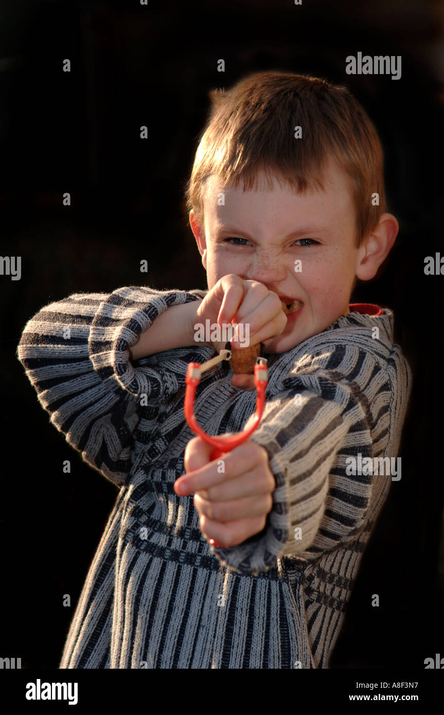 Boy With A Catapult Stock Photo - Alamy