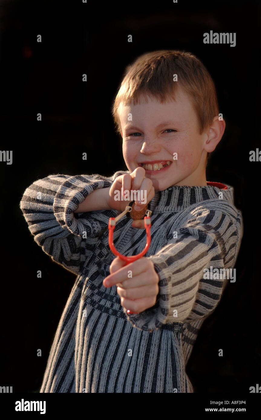 Boy With A Catapult Stock Photo - Alamy