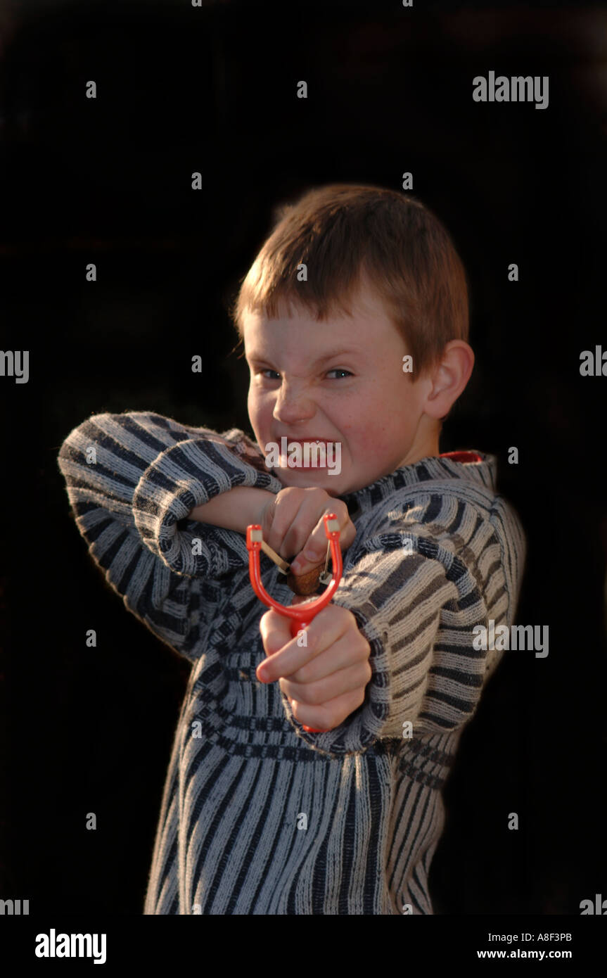 Boy With A Catapult Stock Photo - Alamy