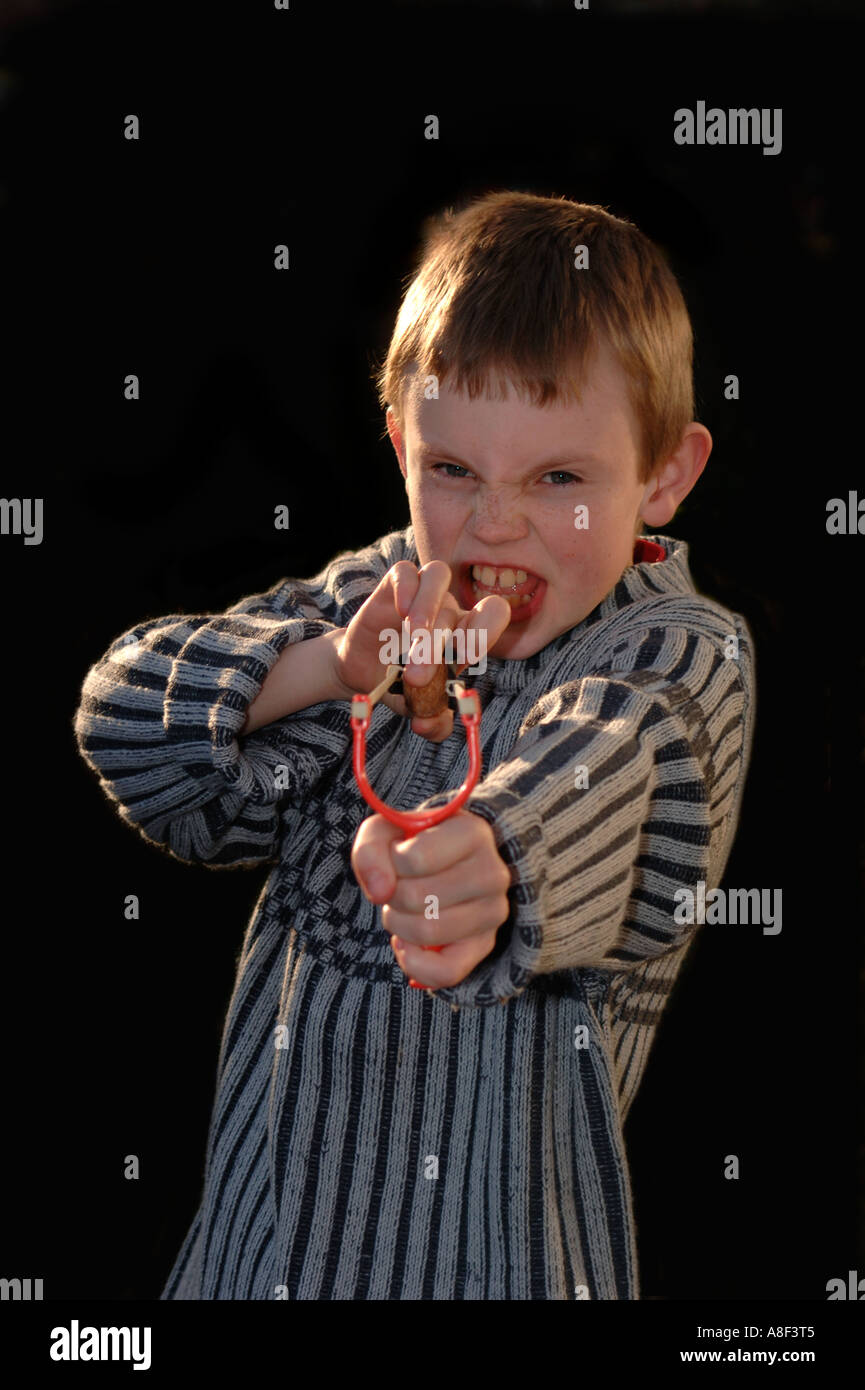 Boy With A Catapult Stock Photo - Alamy