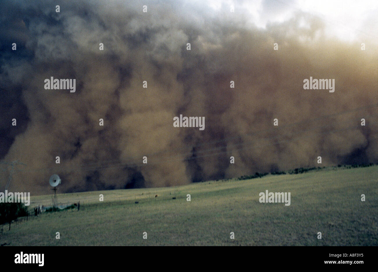 The sun shines through the clouds of a huge dust storm in South Africa ...