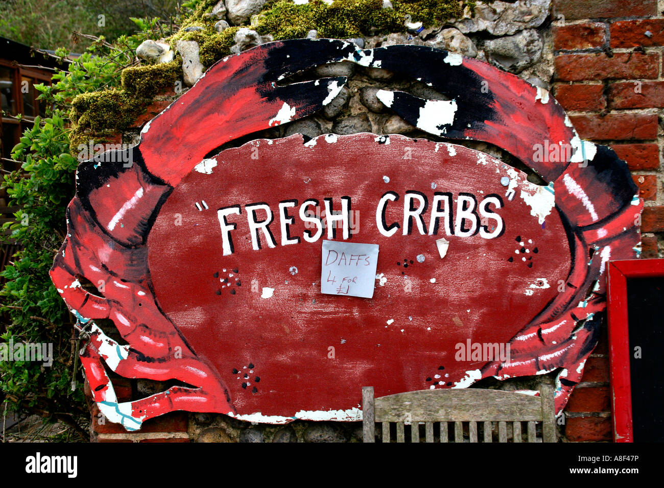 A sign advertising fresh crabs for sale at Blakeney Norfolk UK Stock ...