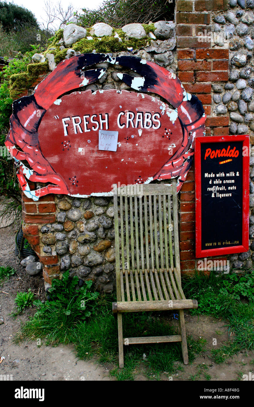 A sign advertising fresh crabs for sale at Blakeney Norfolk UK Stock ...