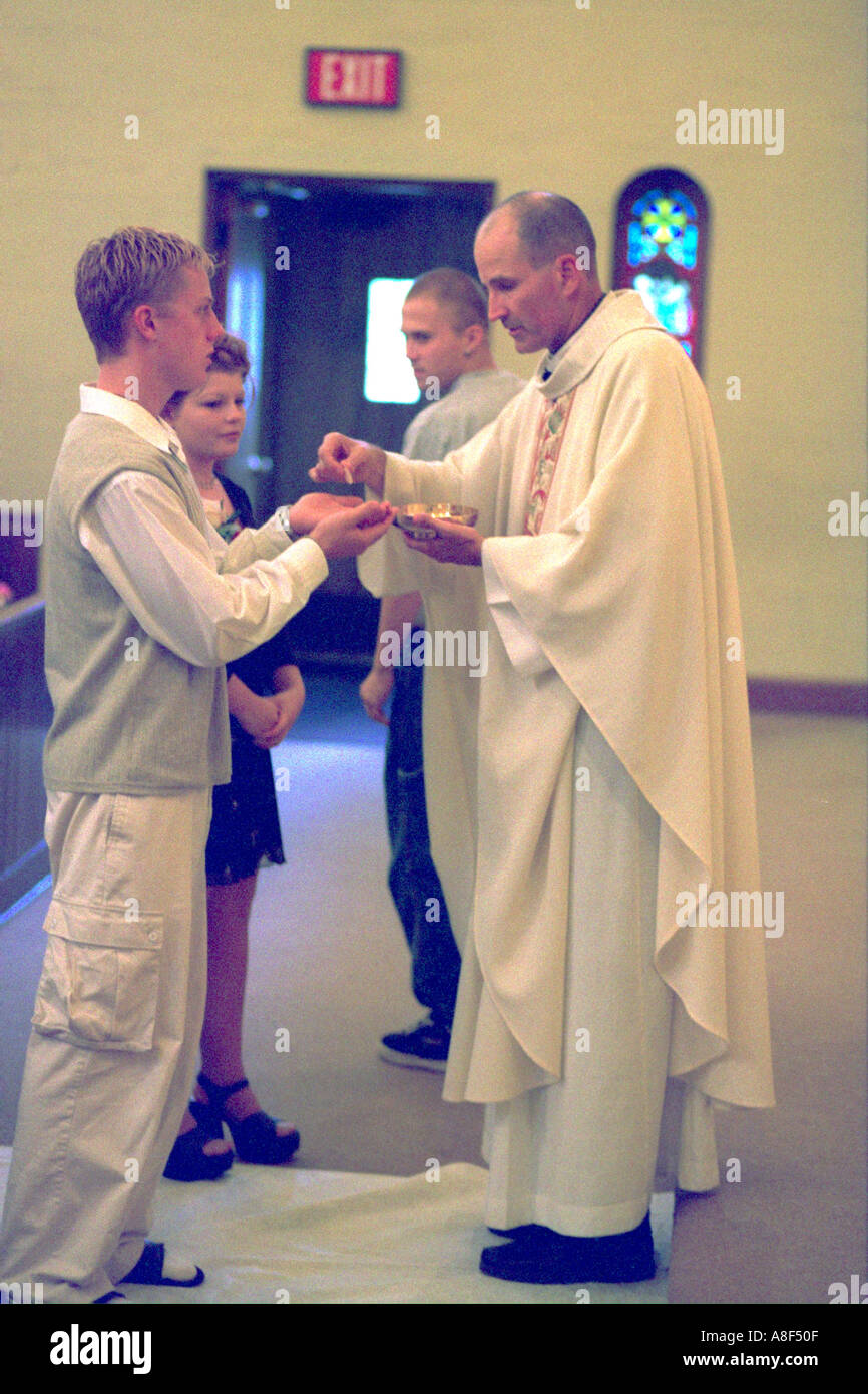 Female priest communion hi-res stock photography and images - Alamy