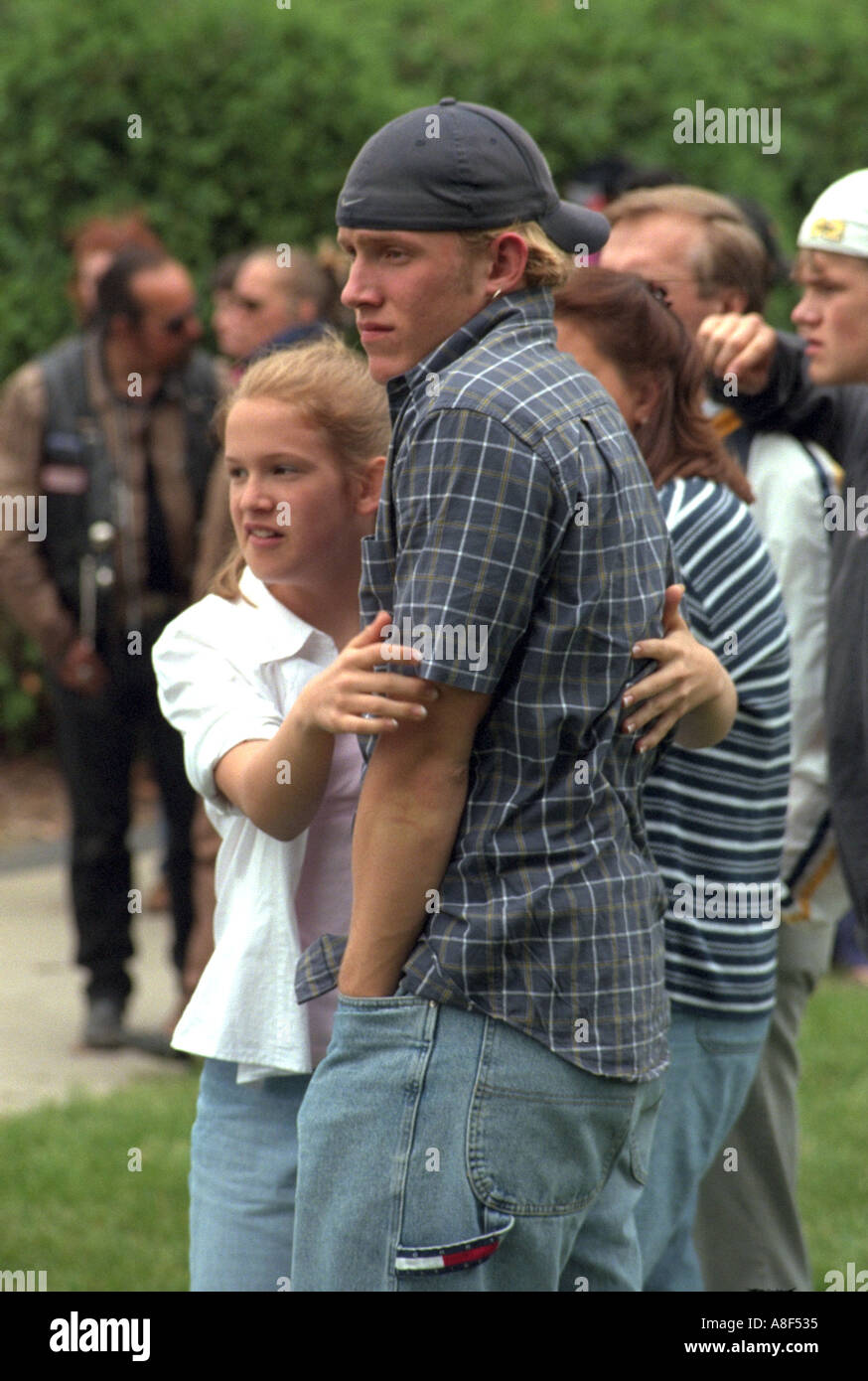 Aids walk volunteers age 18 embracing at Minnehaha Park. Minneapolis ...