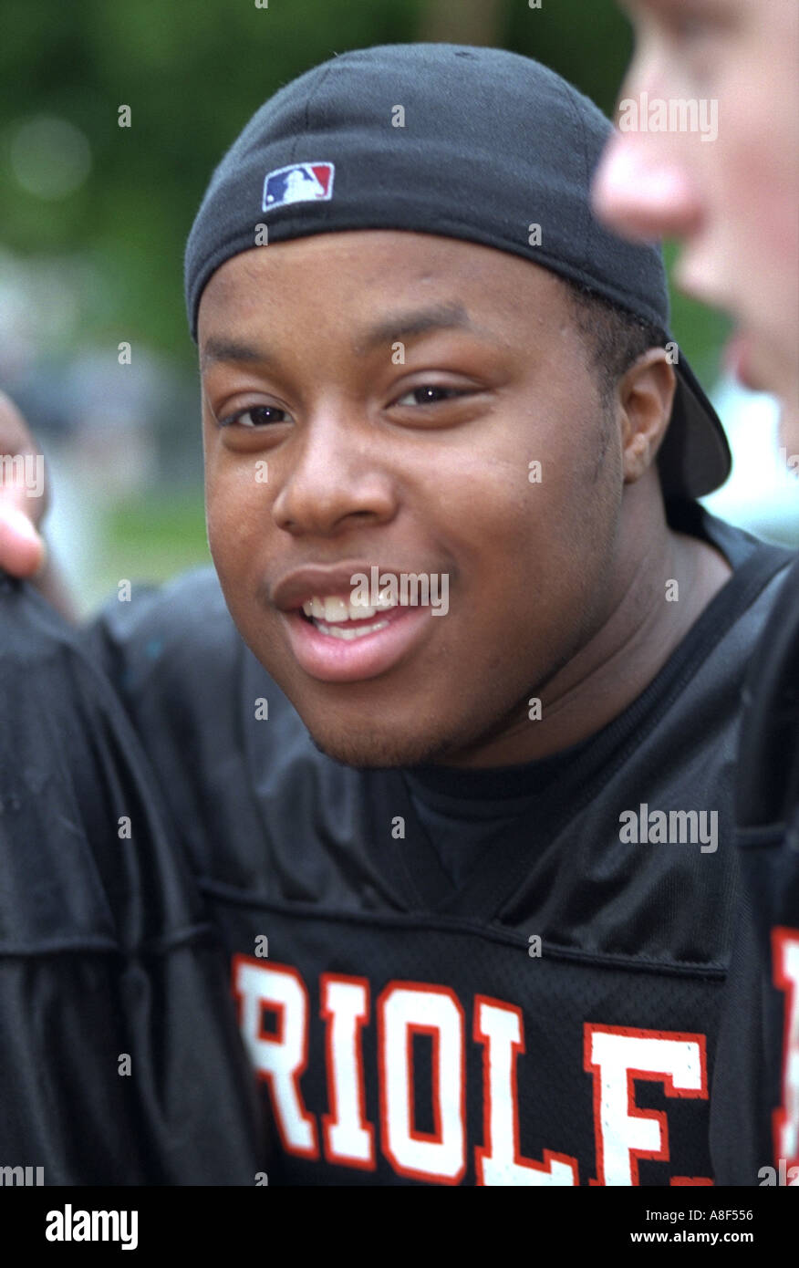 Football player age 15 smiling at the Parktacular Parade. St Louis Park ...