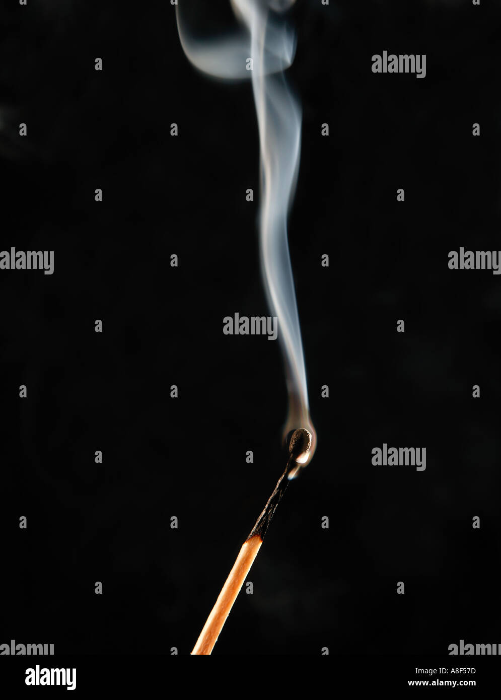 SMOKING MATCH ON BLACK BACKGROUND Stock Photo - Alamy