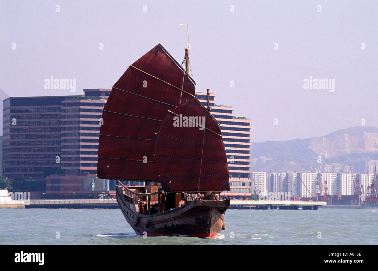Traditional Chinese Junk Sailing Through Victoria Harbour Hong Kong ...