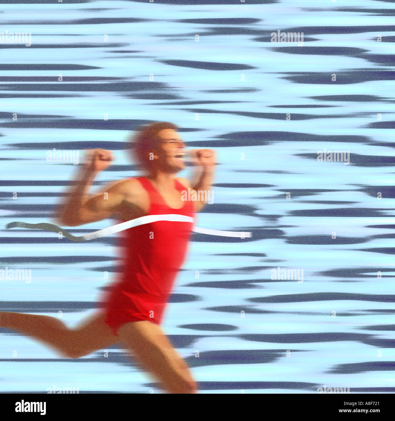 Winner breaking a race tape Stock Photo - Alamy