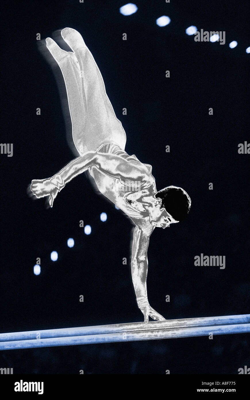 Gymnast on parallel bars Stock Photo - Alamy