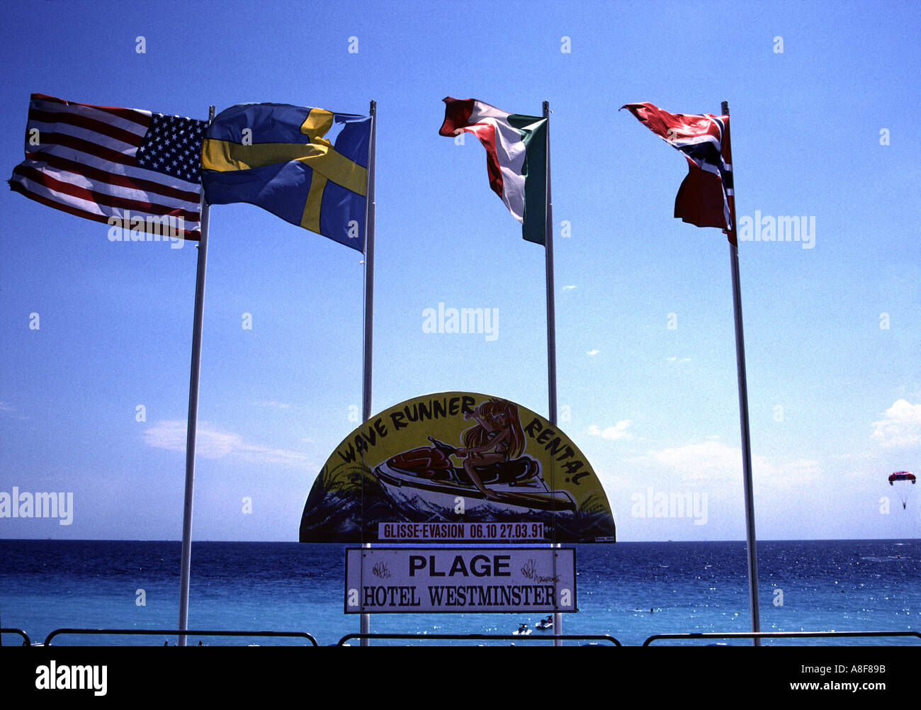 Flags at Nice waterfront France Stock Photo - Alamy