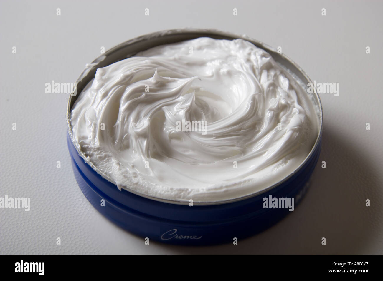 body cream, jar, blue, white, close up, white background, moisturizer ...