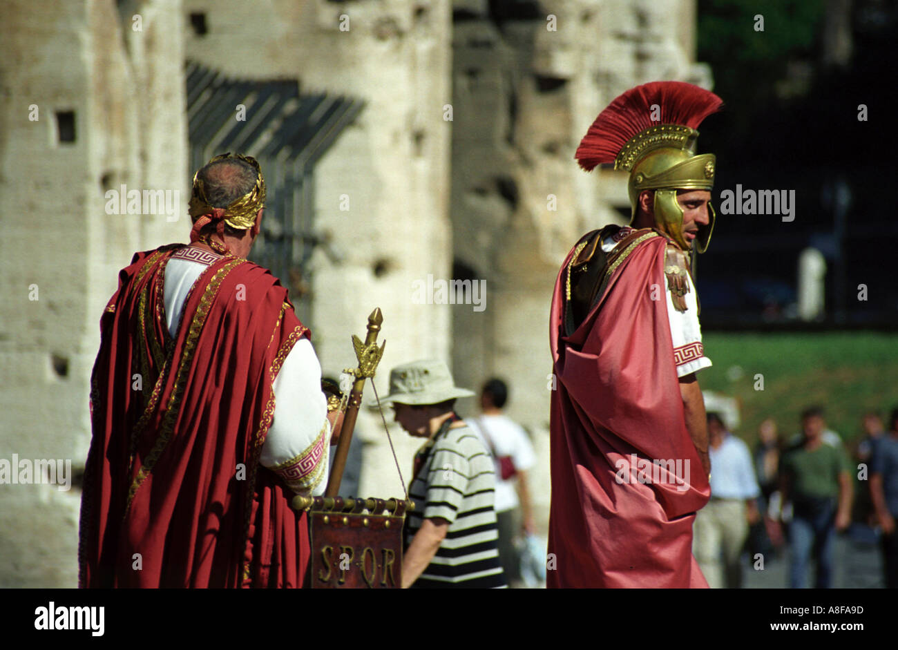 Actors wearing tunics as ancient Rome cityzens by Colosseum Italy Stock ...