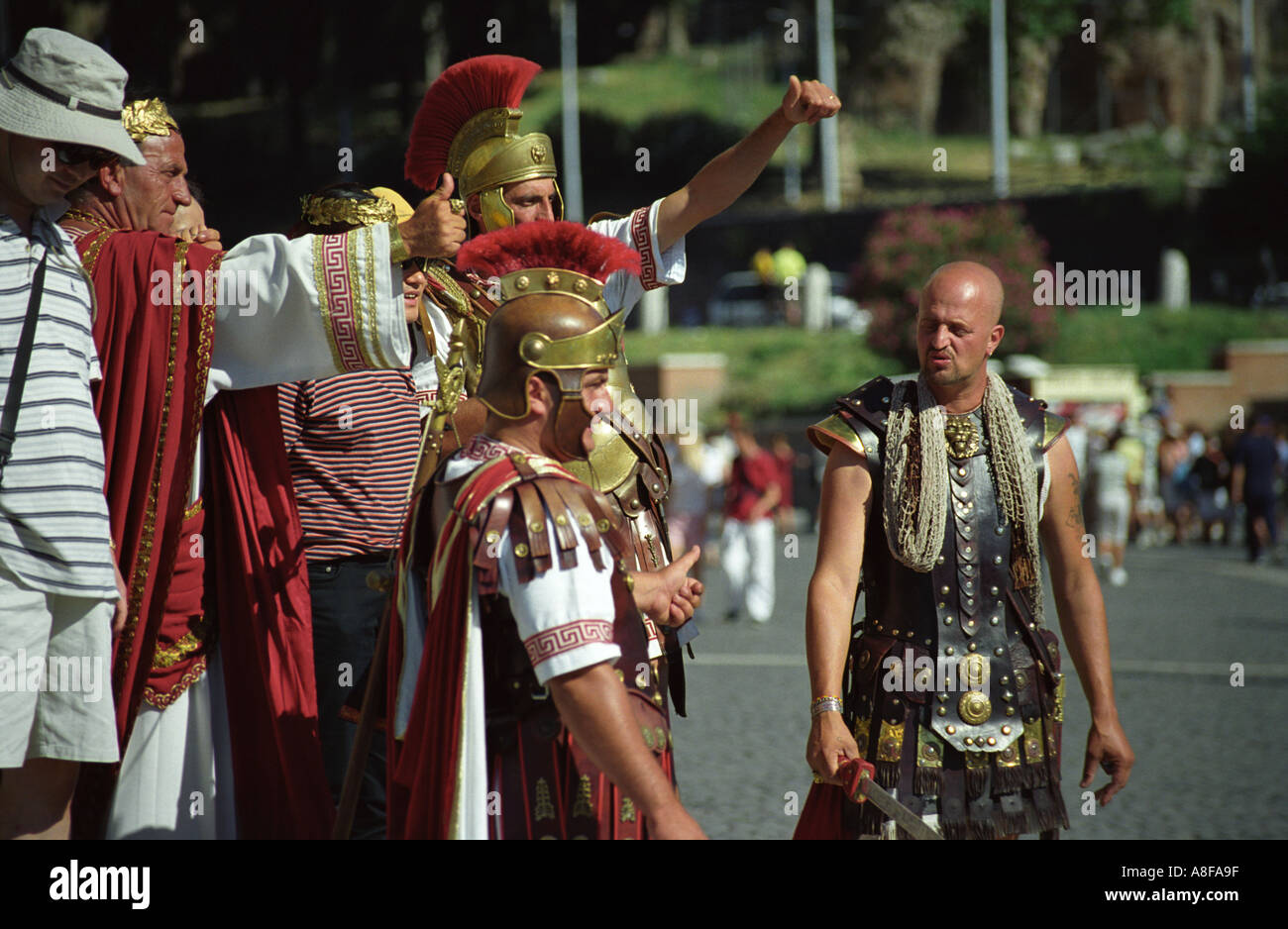 Actors armmoured as Rome soldiers by Colosseum Italy Stock Photo - Alamy